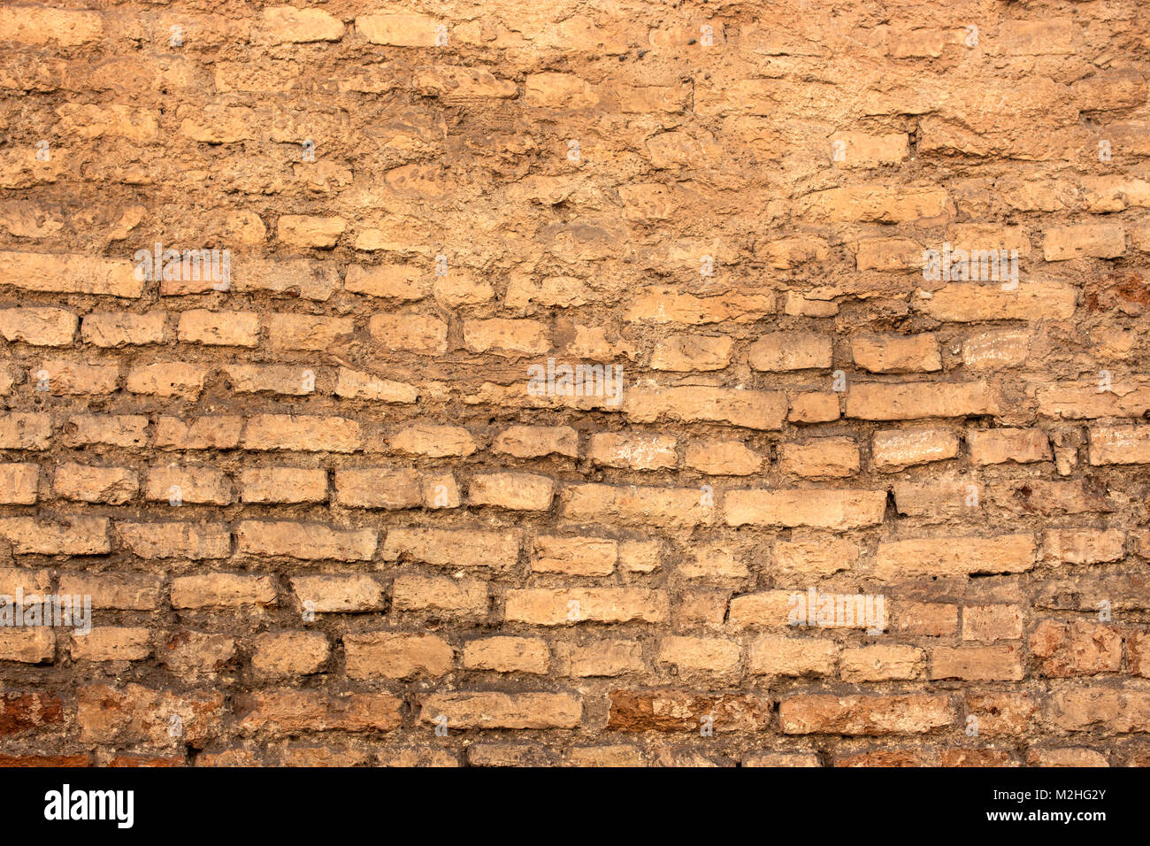Old brick wall in a background image Stock Photo - Alamy