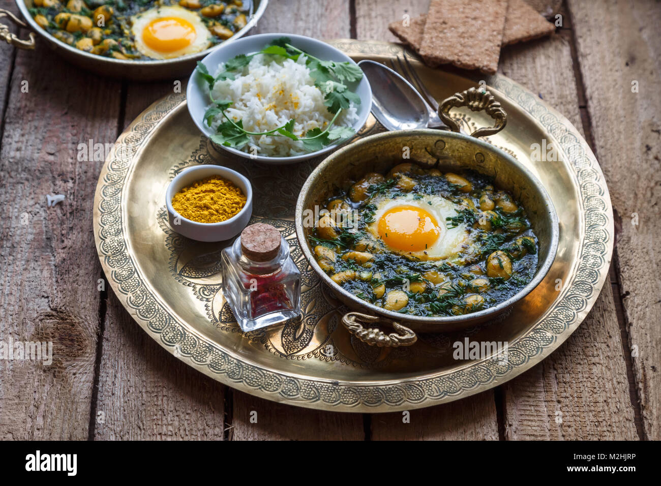 Baghali ghatogh - Iranian dish made with bean, dill, and Eggs Stock ...