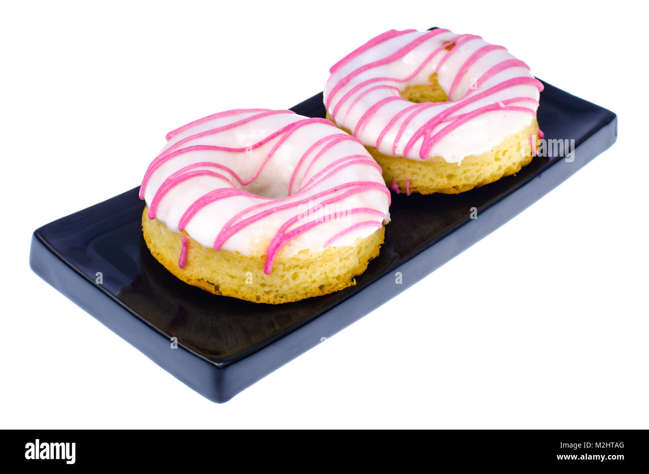 Two donuts on black hi-res stock photography and images - Alamy