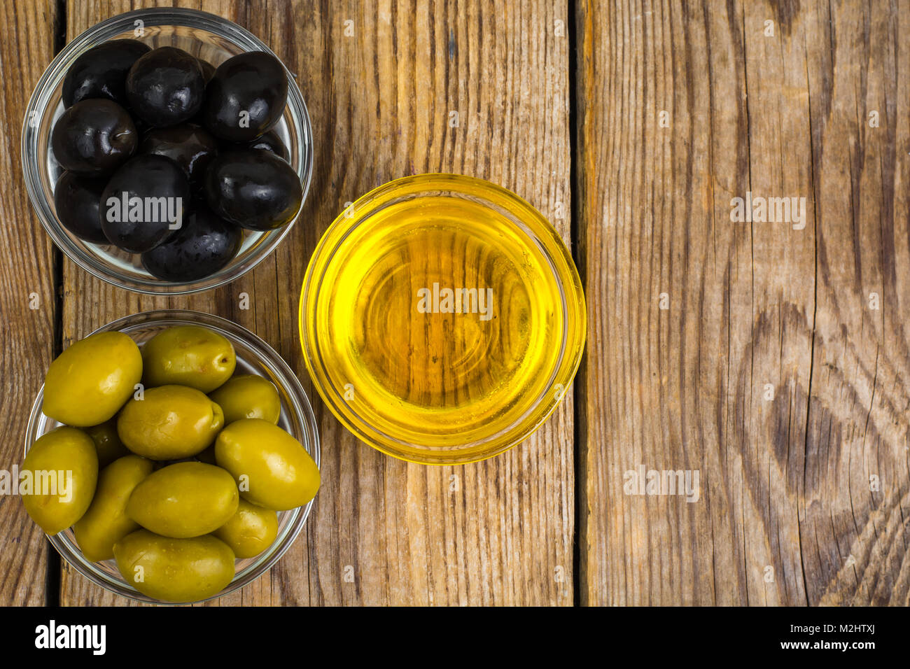 Olives with olive oil Stock Photo - Alamy
