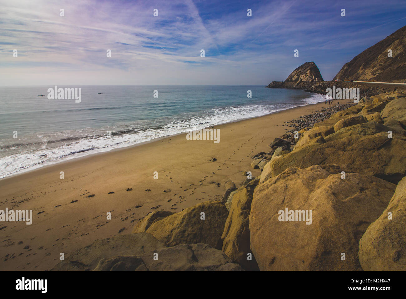 Rocky shoreline view of the Point Mugu Rock along Pacific Coast Highway ...