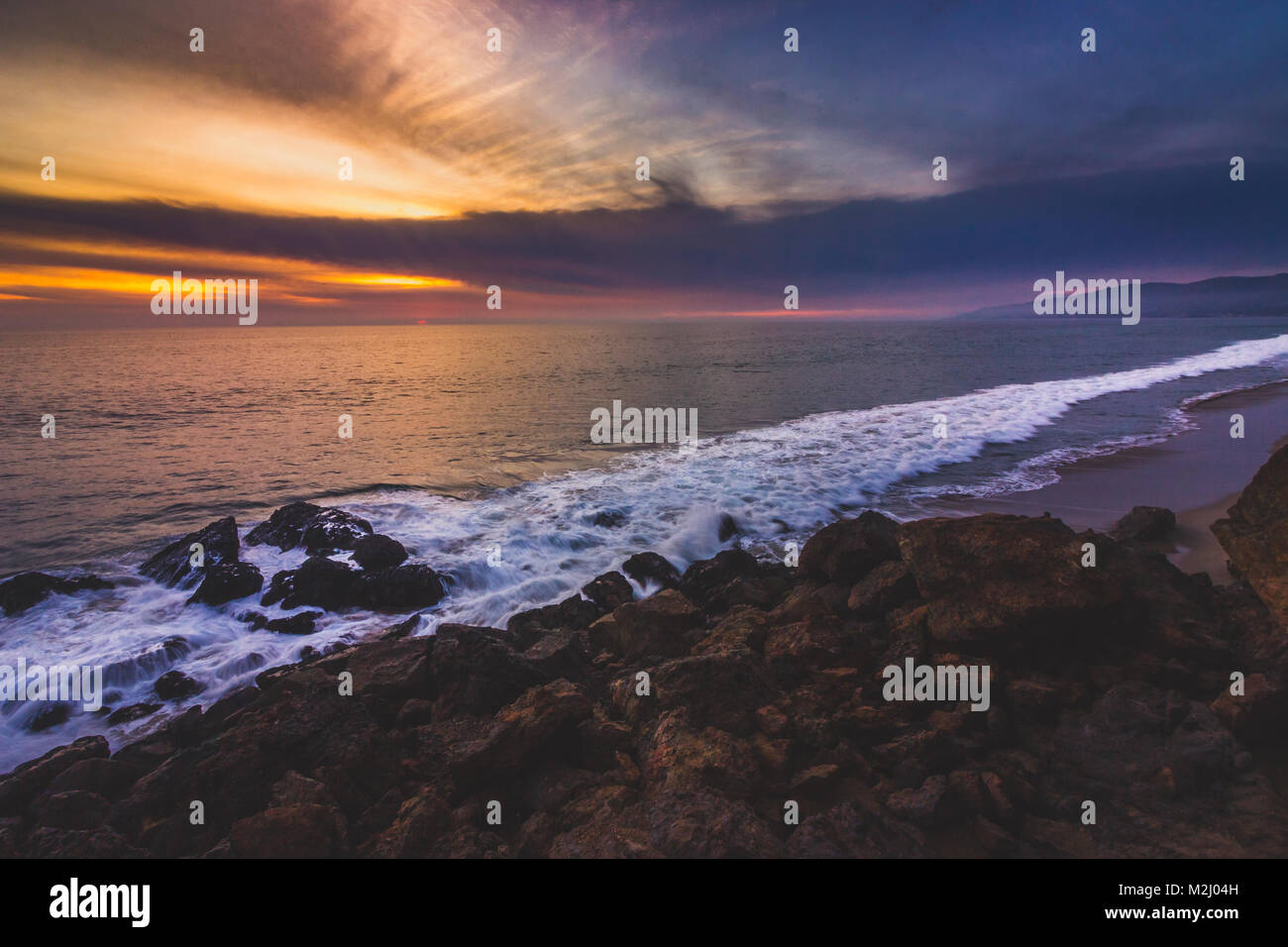 Amazing sunset along Point Dume State Beach with colorful sky, waves ...
