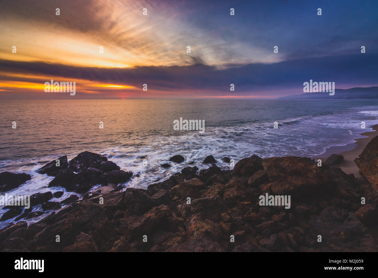 Amazing sunset along Point Dume State Beach with colorful sky, waves ...