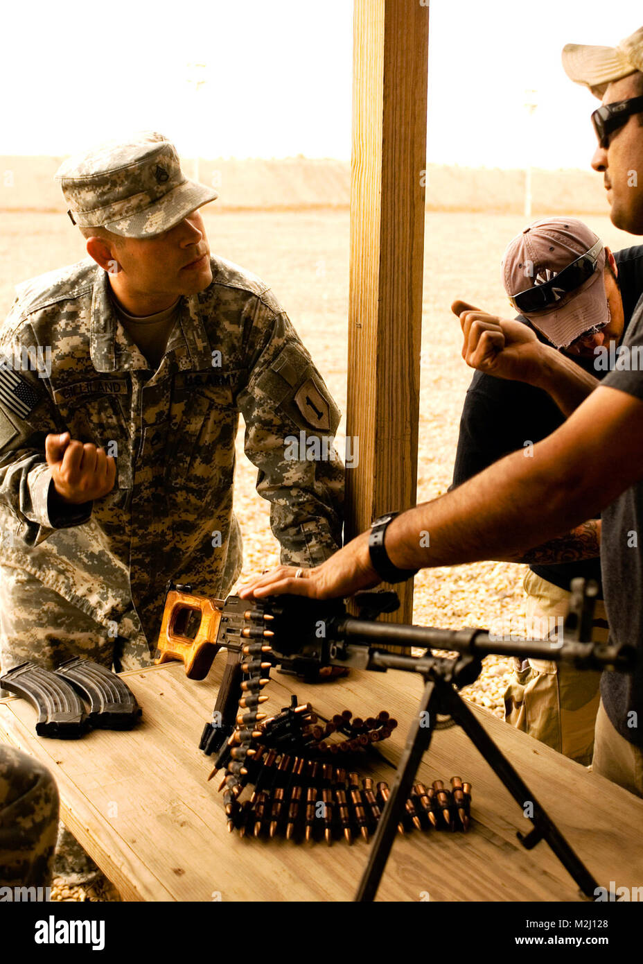Learning how to load a foreign machine gun by 1st Armored Division and ...