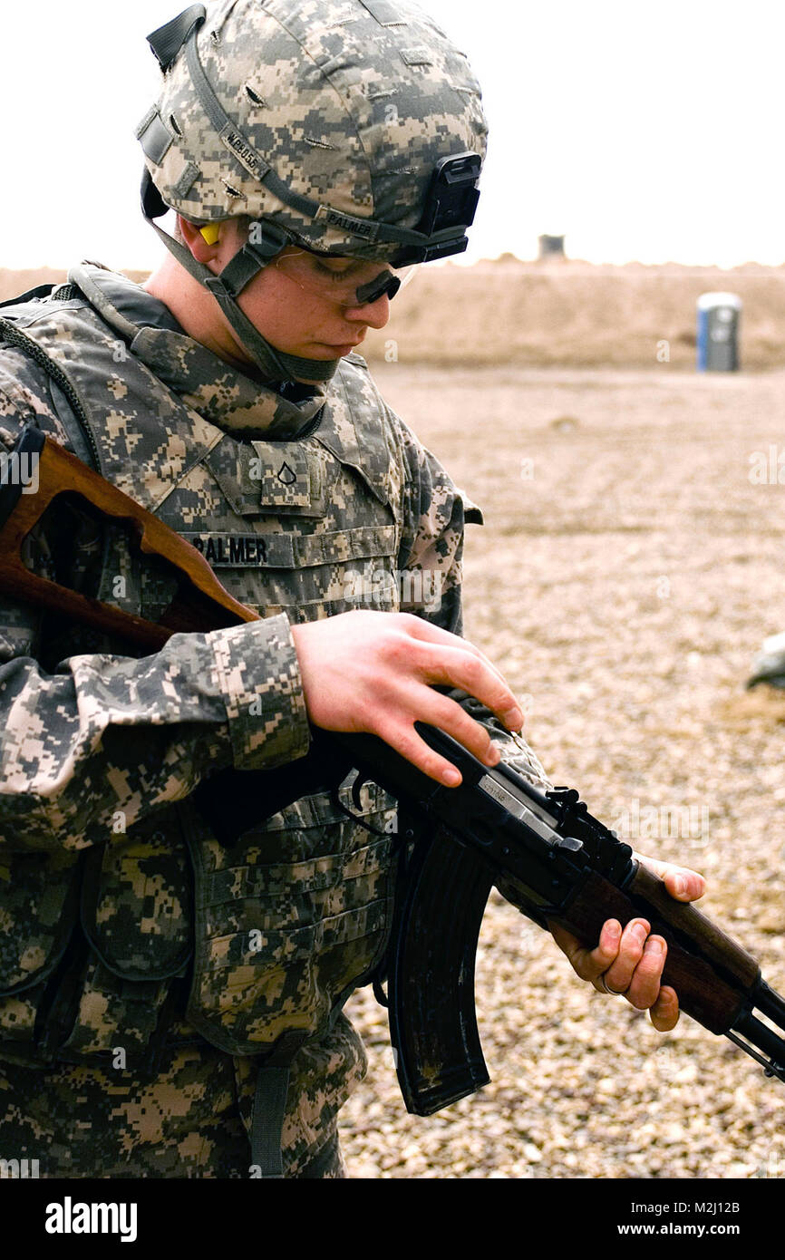 Extracting a jammed bullet by 1st Armored Division and Fort Bliss Stock ...