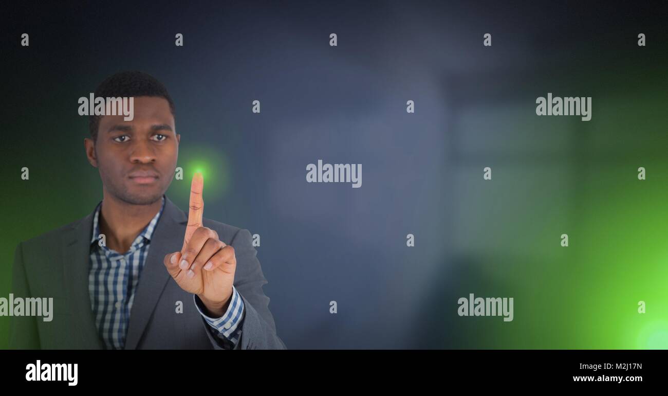 Man's Hand touching green light Stock Photo - Alamy