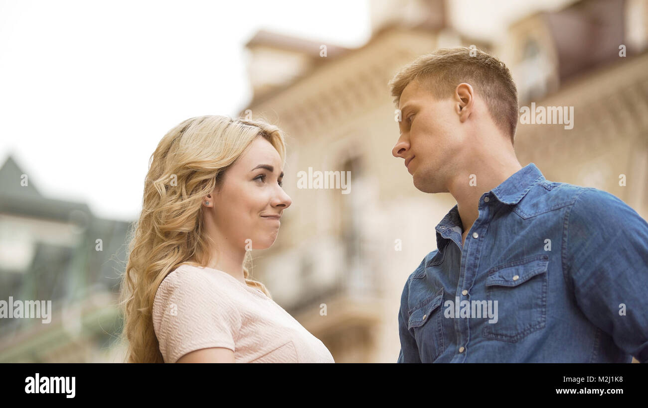 Man approaching woman behind hi-res stock photography and images - Alamy