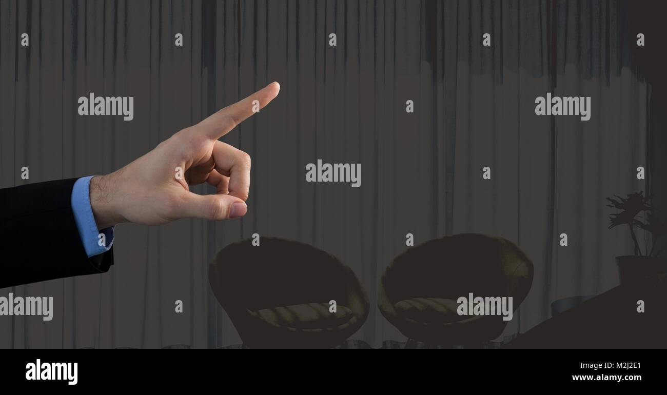 Hand pointing with dark background Stock Photo - Alamy
