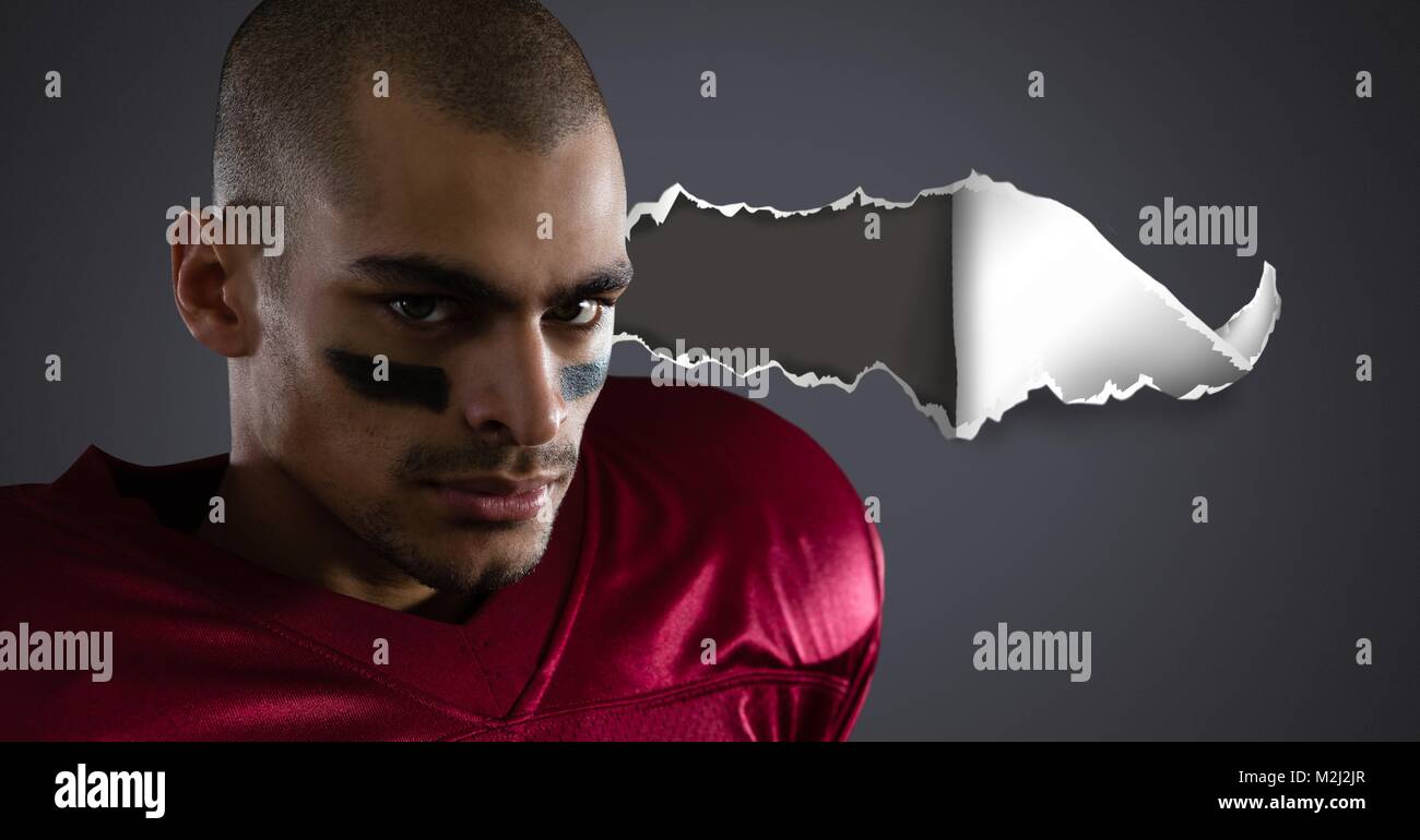 American football player with torn paper Stock Photo - Alamy