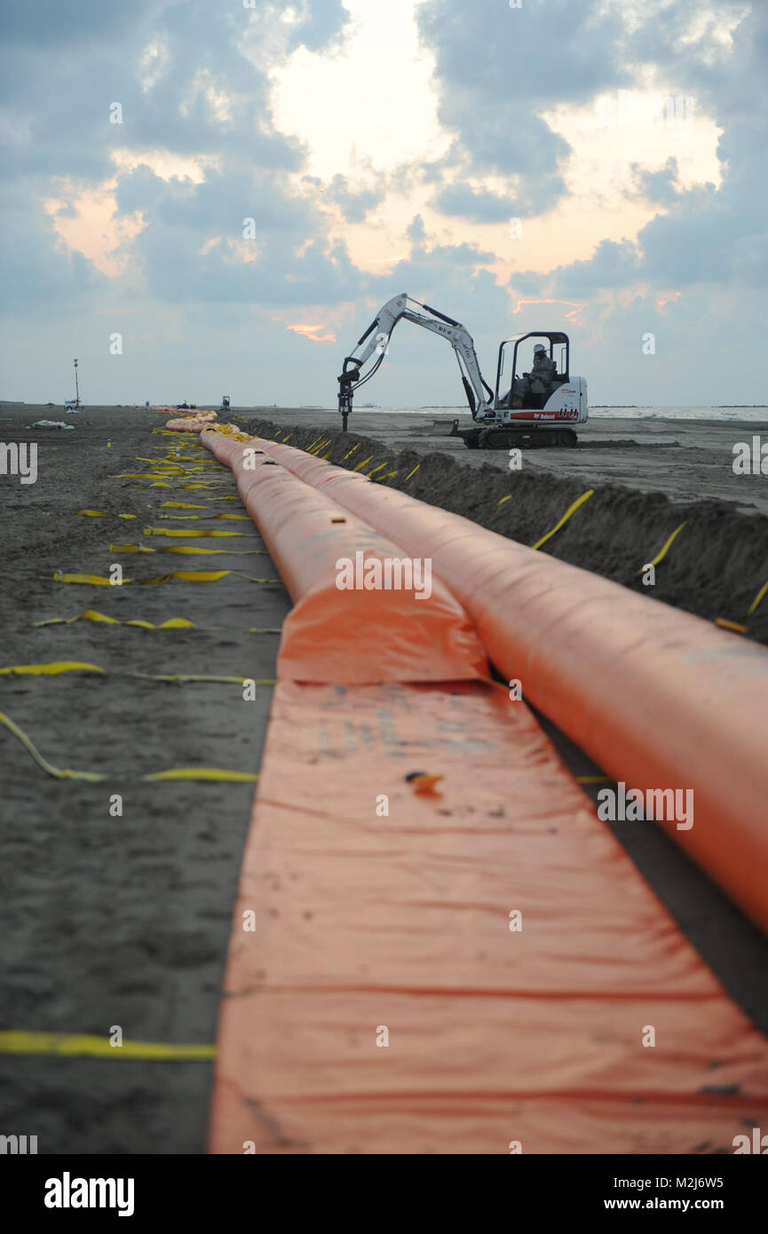 GRAND ISLE, La. - Soldiers with the Louisiana Army National Guard work ...