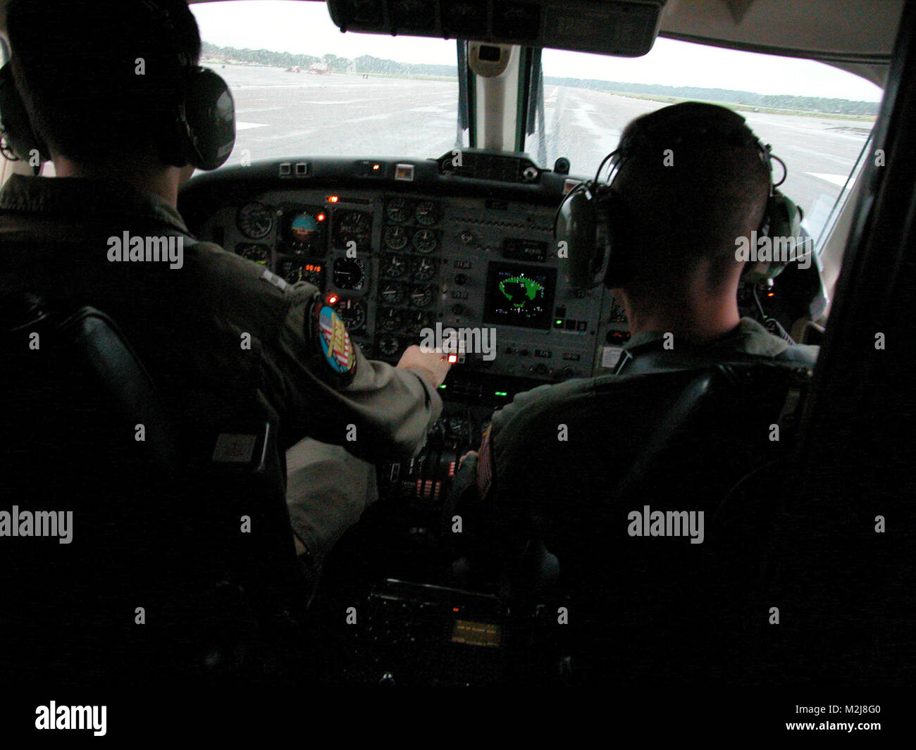 Lt. John Alcorn and Marine Major Jack "Sparky" Landreth pilot the c12b ...
