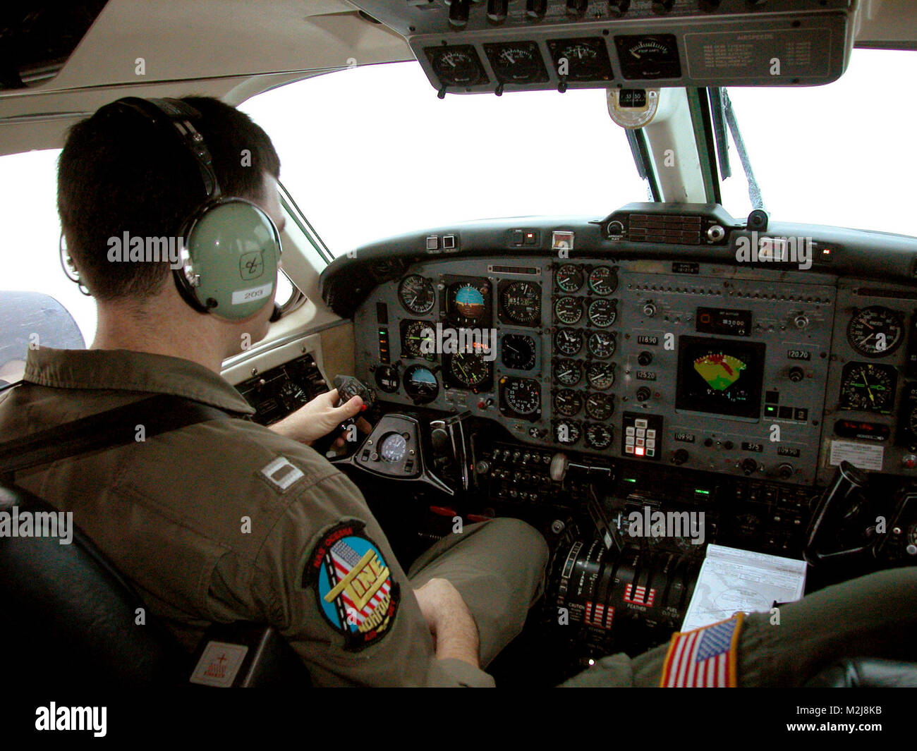 Lt. John Alcorn and Marine Major Jack "Sparky" Landreth pilot the c12b ...