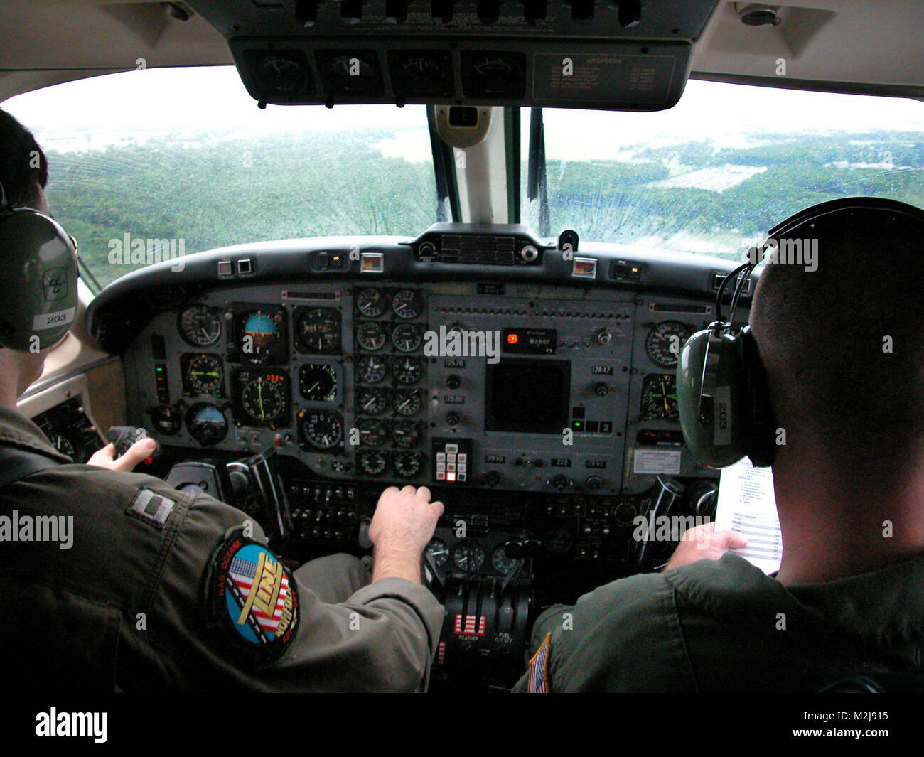 Lt. John Alcorn and Marine Major Jack "Sparky" Landreth pilot the c12b ...