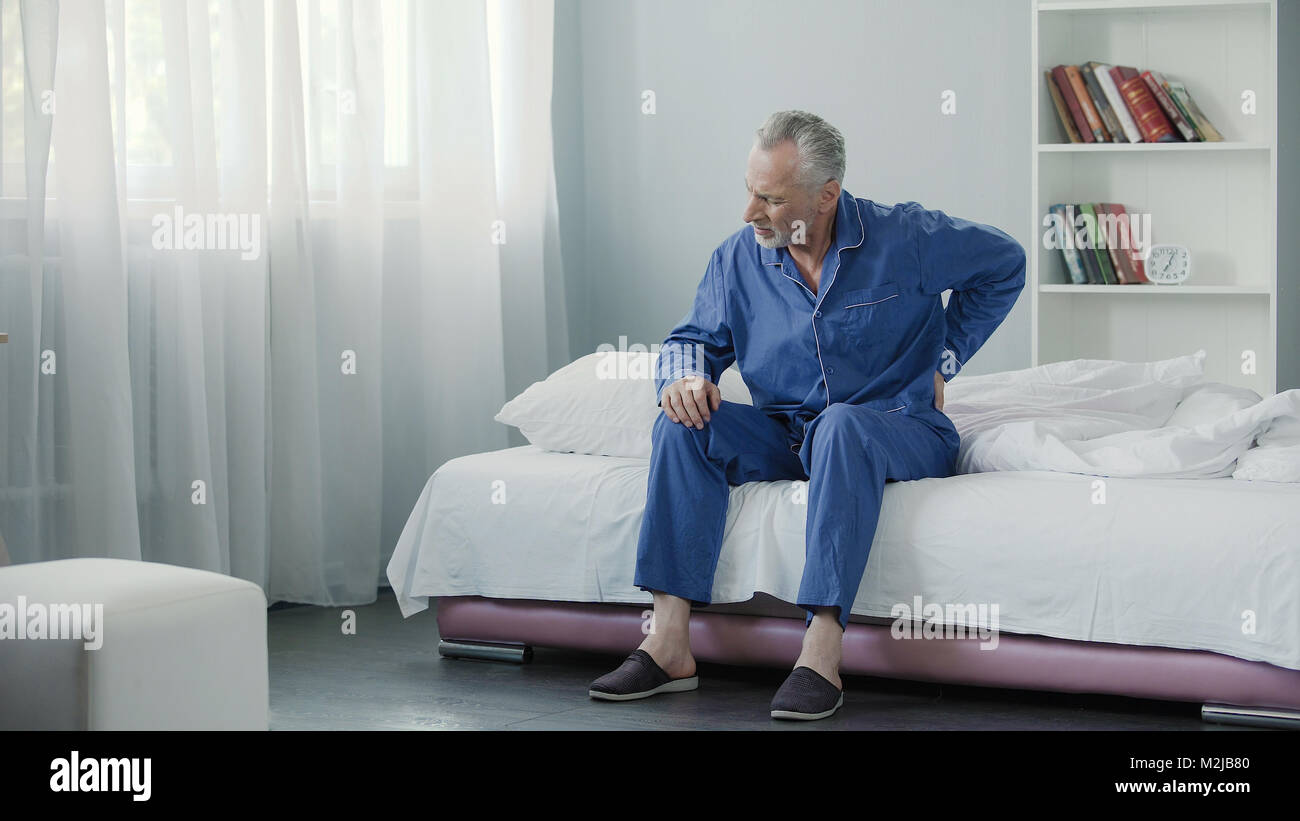 Senior man bed getting up hi-res stock photography and images - Alamy