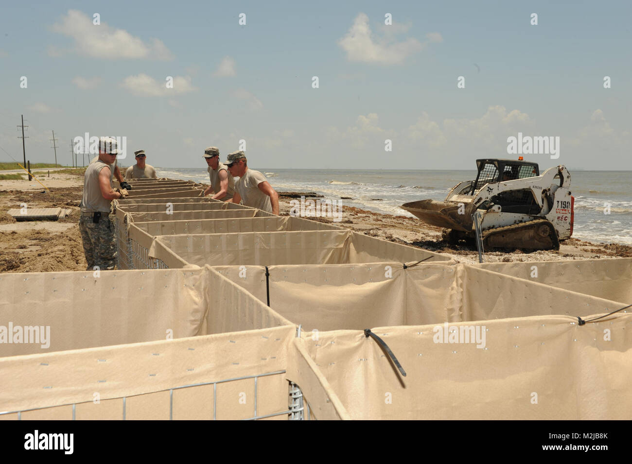 CAMERON, La. - Louisiana National Guardsmen construct a Hesco ...