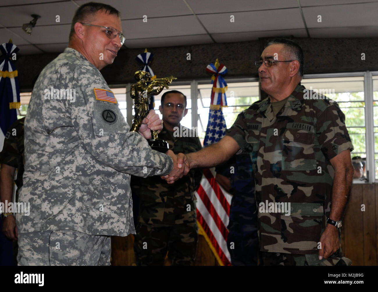 Lt. Gen. Jack Stultz, Chief, Army Reserve, receives a gift from the ...