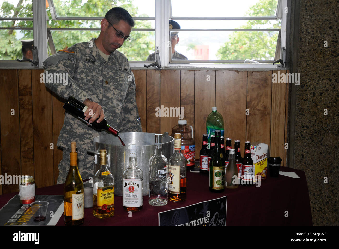 Maj. Colon adds his ingredient to the grog during the Army's 235th ...