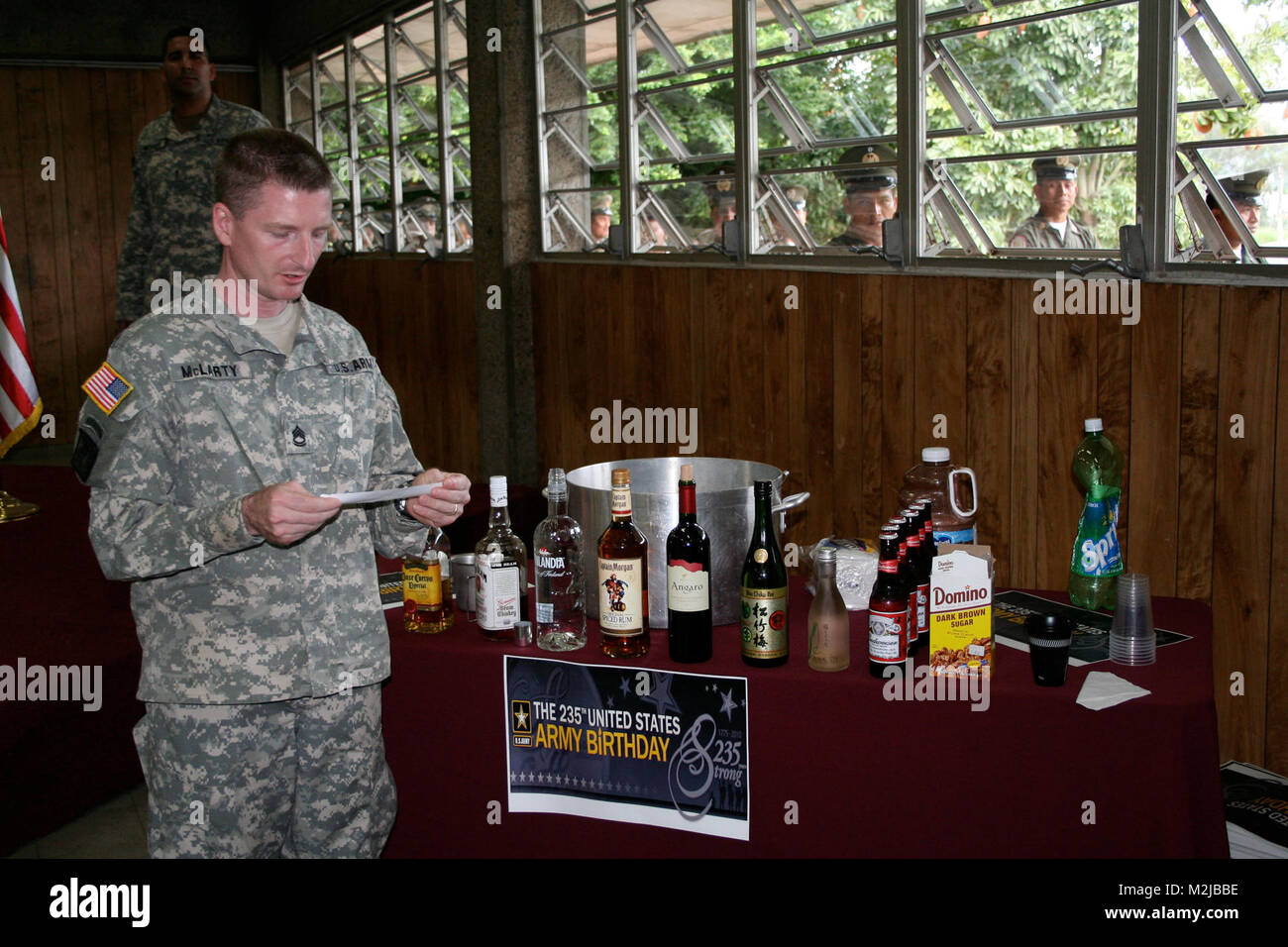 Sgt. 1st Class Samuel Mclarty prepares to add an ingredient to the grog ...