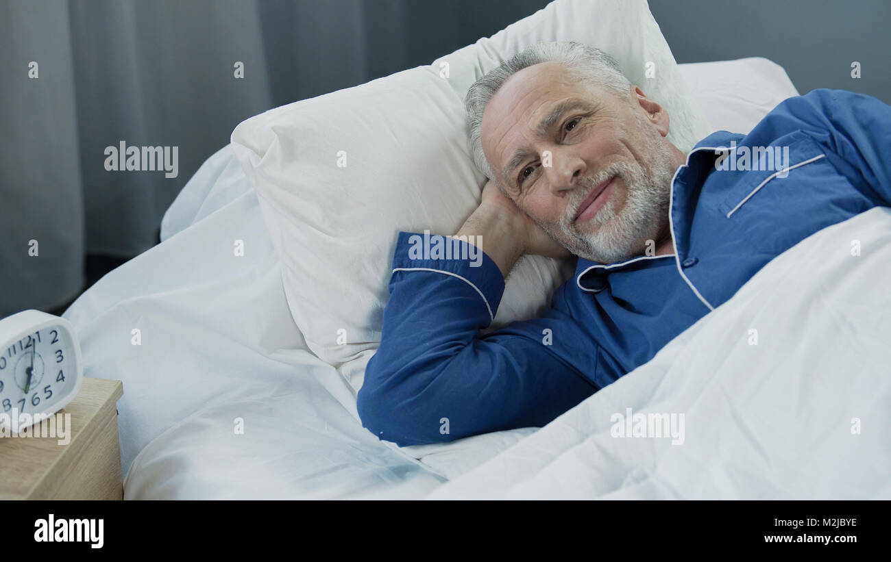 Mature man waking up hi-res stock photography and images - Alamy