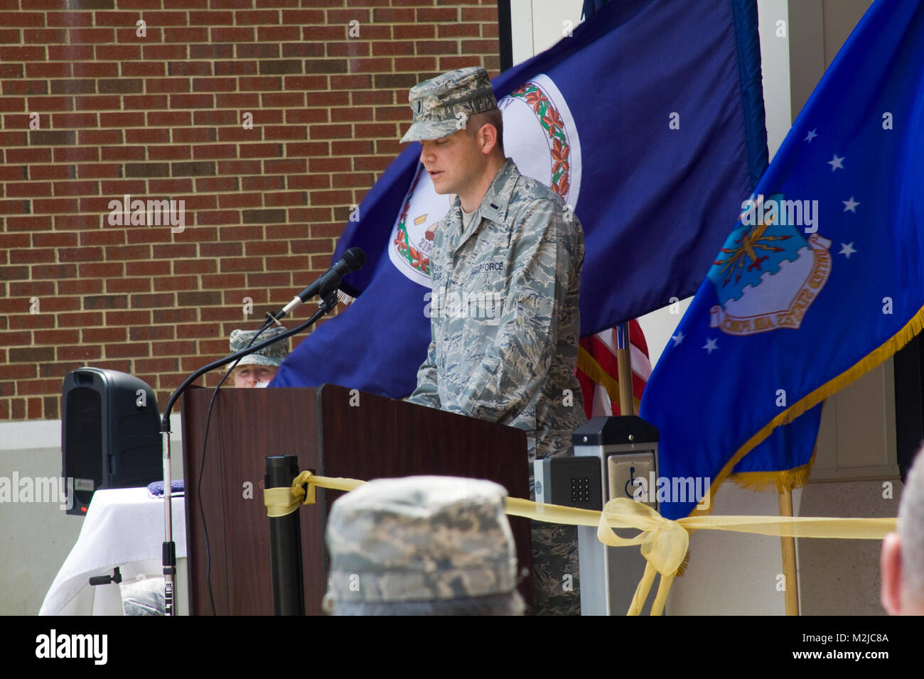 1st Lt. Matthew L. Pinegar performs master of ceremonies duties at a ...