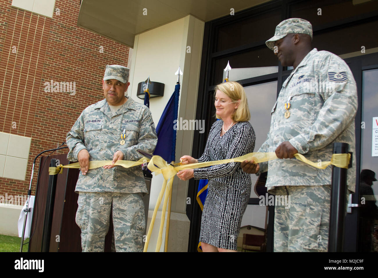 Master Sgt. Joaquin Raya (left) and Tech Sgt. Gregory Artis flank ...