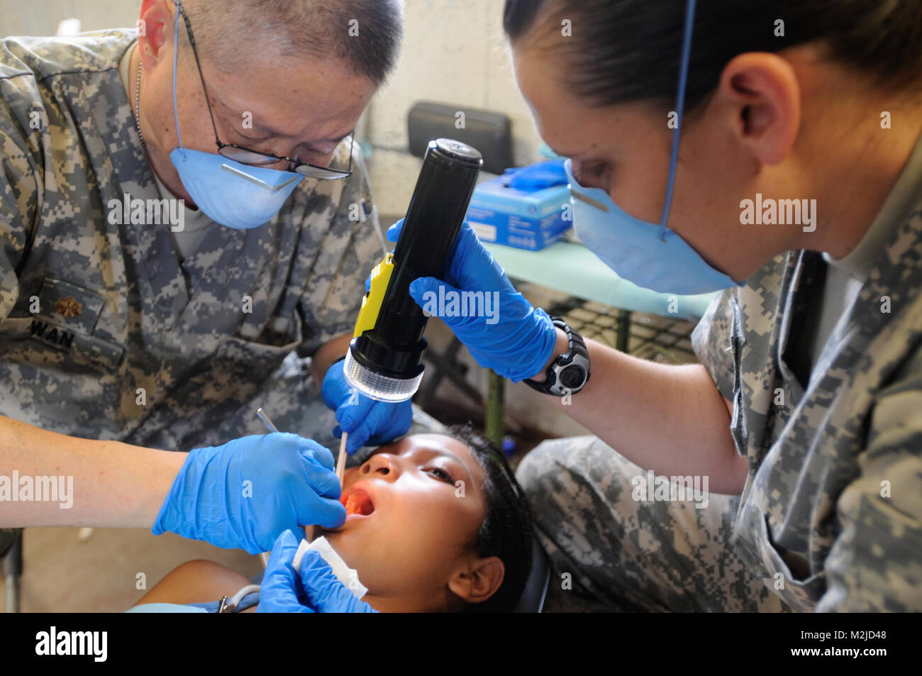Maj. George Wan from Los Angeles and Spc. Sarah Poe from Moreno Valley ...
