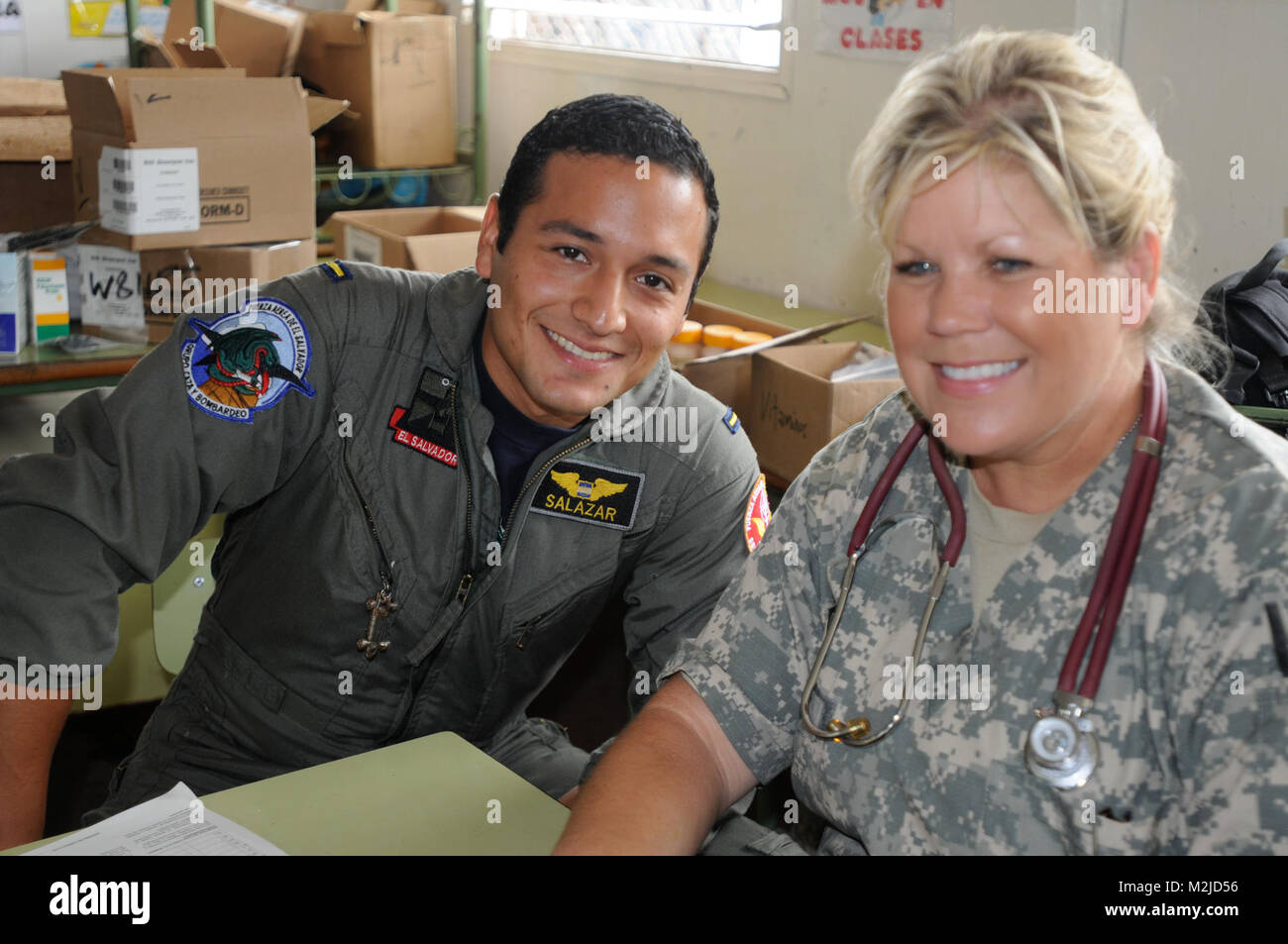 Maj. Dawn Frost from Vernon, Fla. smiles with her Salvadorian ...