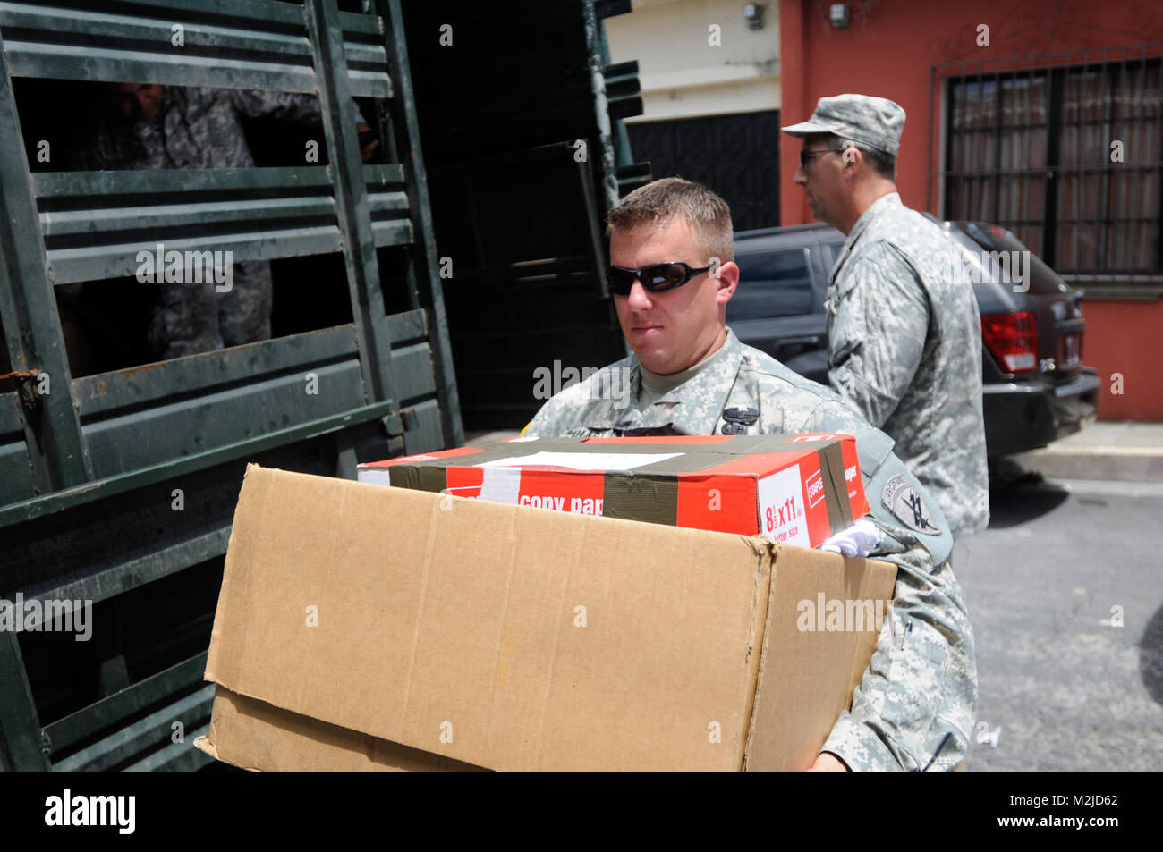 Sgt. 1st Class Justin Lockhart from Mckinney, Texas delivers clothes to ...