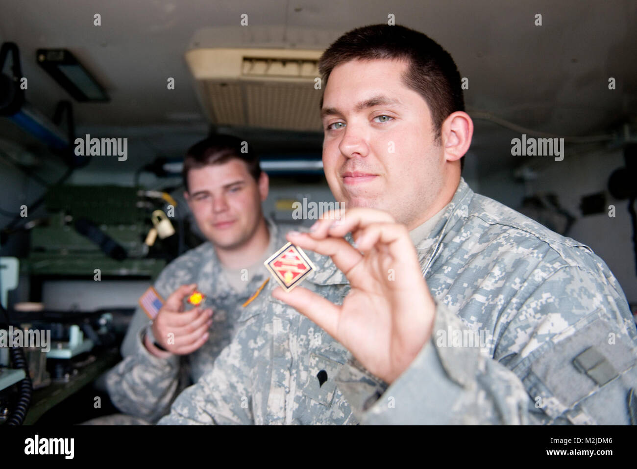 Spc. Justin Wooten (RIGHT) a resident of Guthrie and a forward observer ...