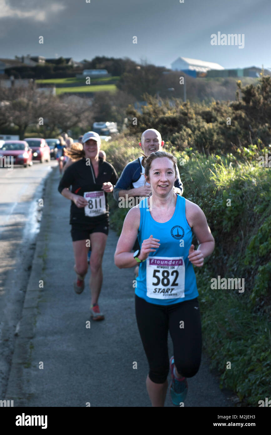 Runners competing in a road race in Newquay Cornwall Stock Photo - Alamy