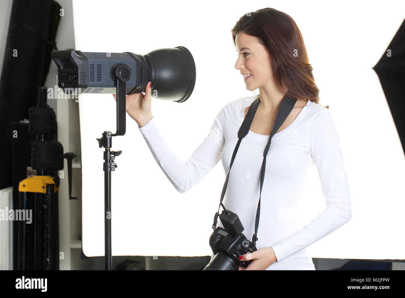 female photographer working in her studio Stock Photo - Alamy