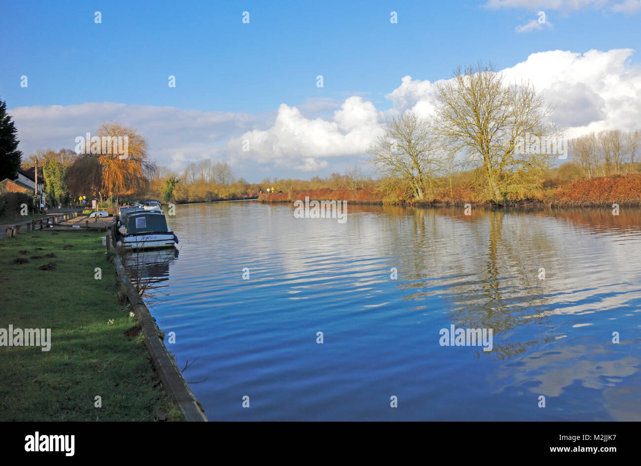 A view of the River Yare with moored boats on the Norfolk Broads in ...
