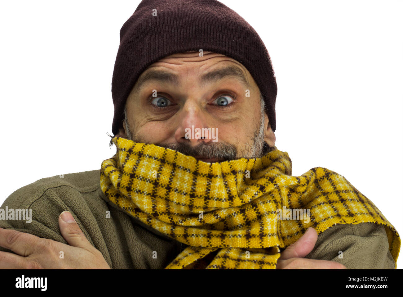 smiling mature man freezing over white background Stock Photo - Alamy