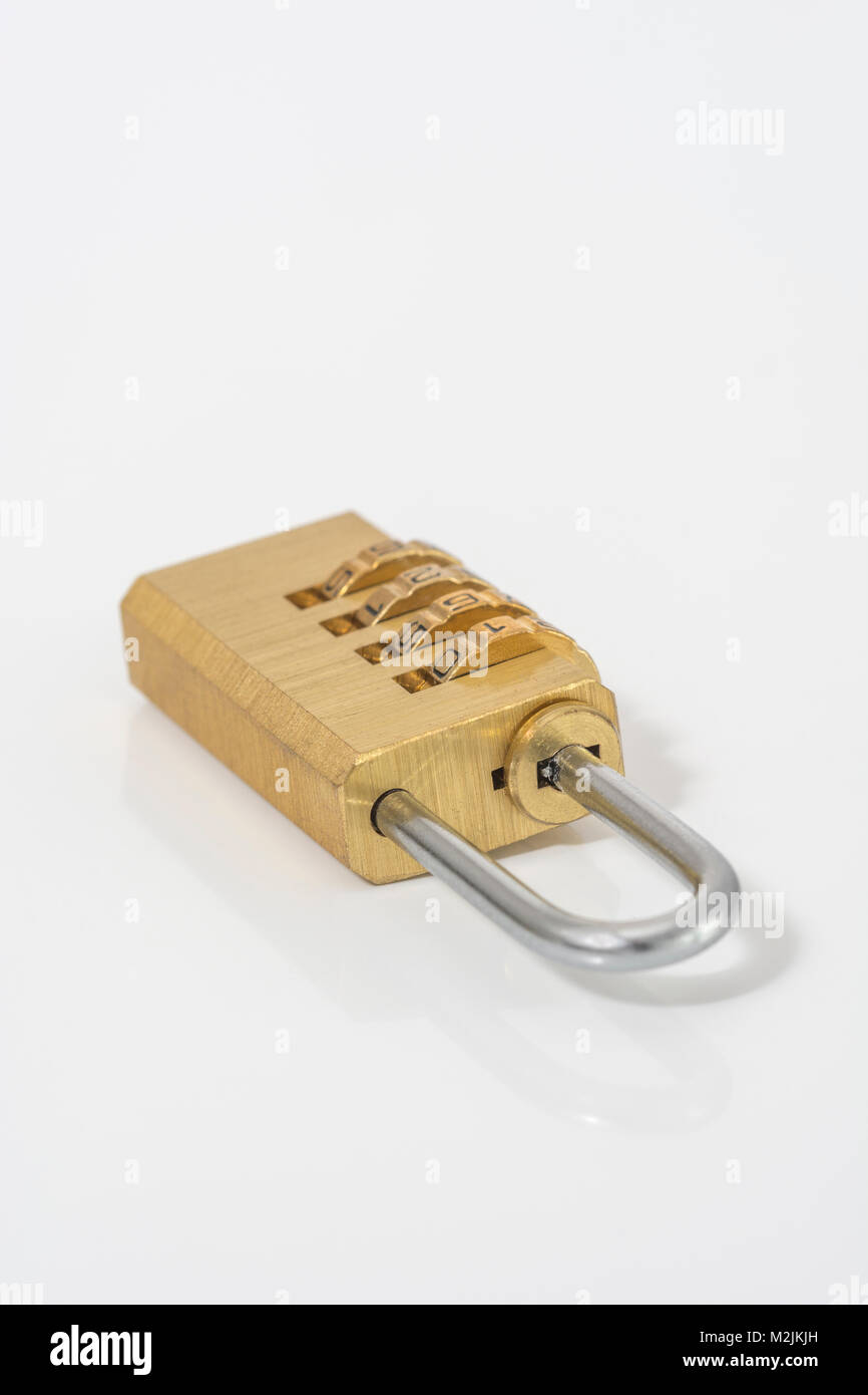 Small combination padlock on plain background - as visual metaphor for ...