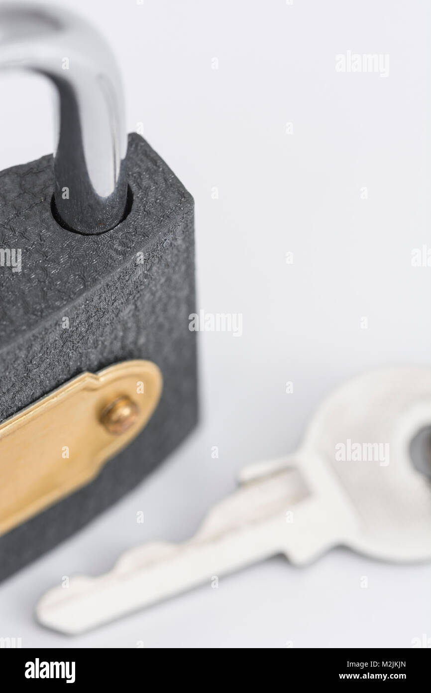 Small padlock on plain background. For concept of data security, email ...