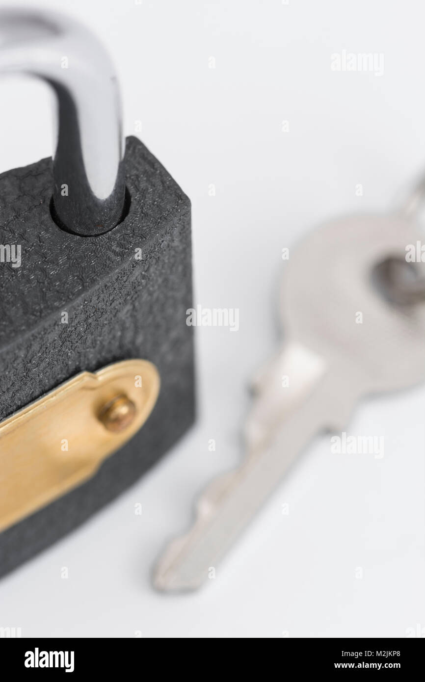 Small padlock on plain background. For concept of data security, email ...
