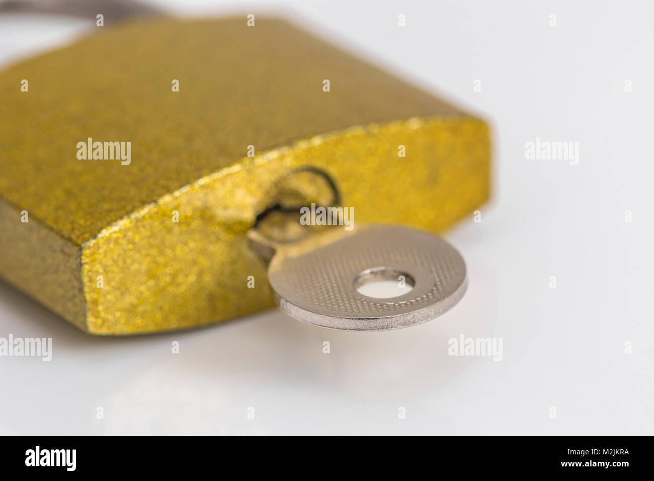 Small padlock on plain background. For concept of data security, email ...