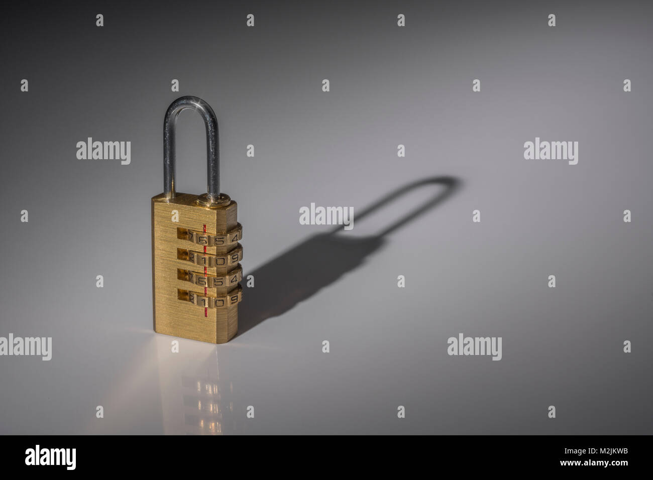 Small combination padlock on plain background. Metaphor for concept of ...