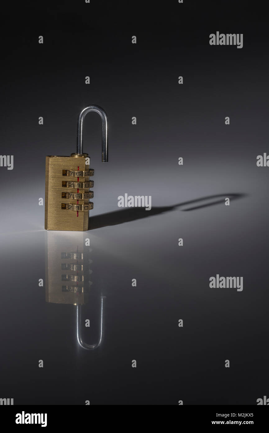 Small combination padlock on plain background - visual metaphor for ...