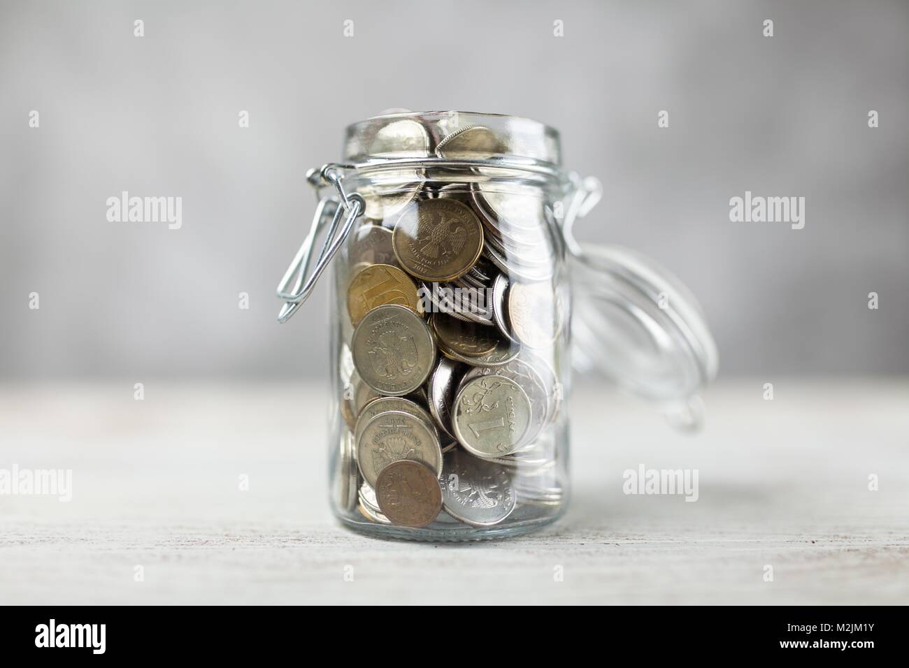 Jars of money hi-res stock photography and images - Alamy