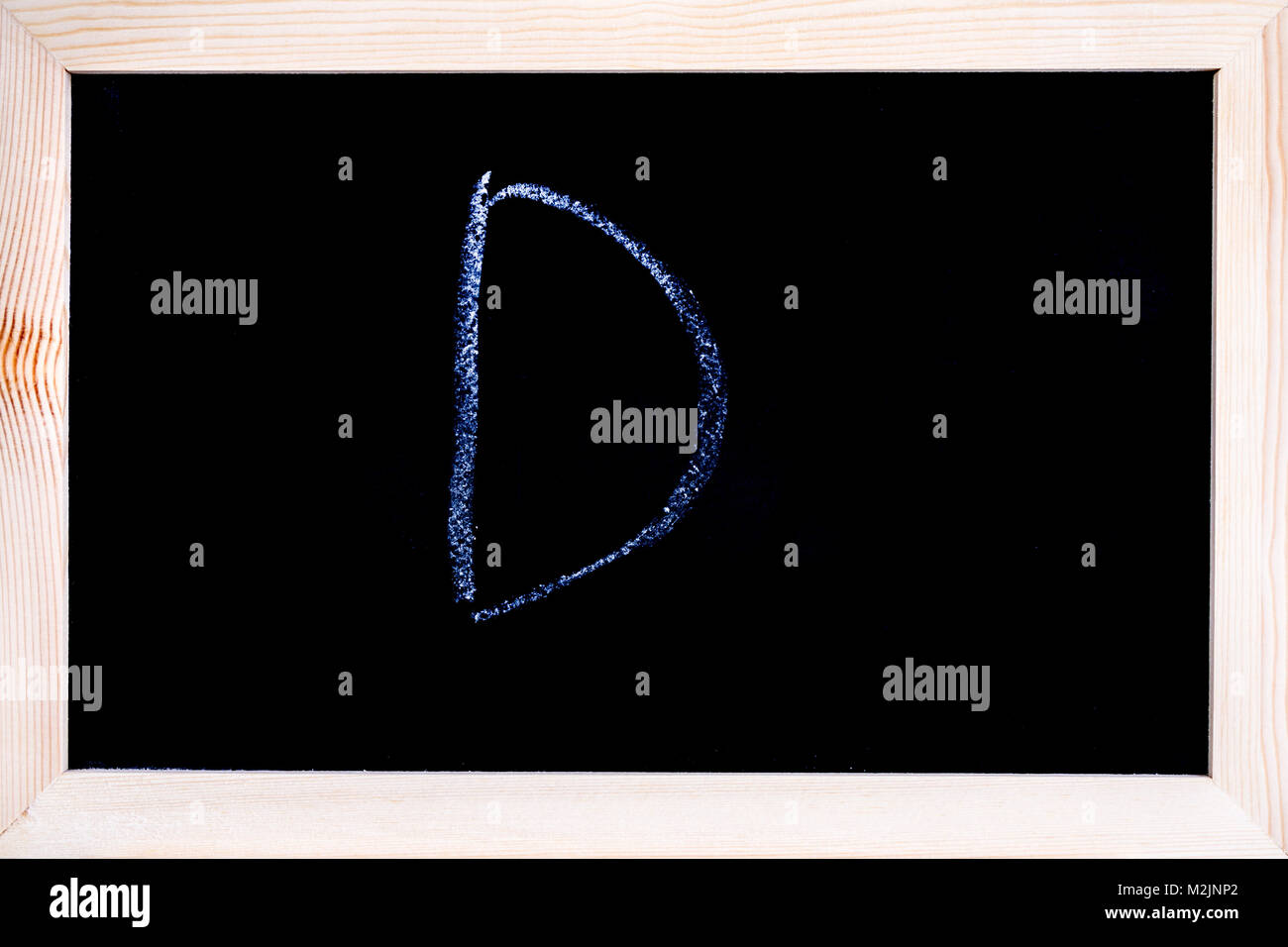 Blackboard with white chalk writing showing grade D Stock Photo - Alamy