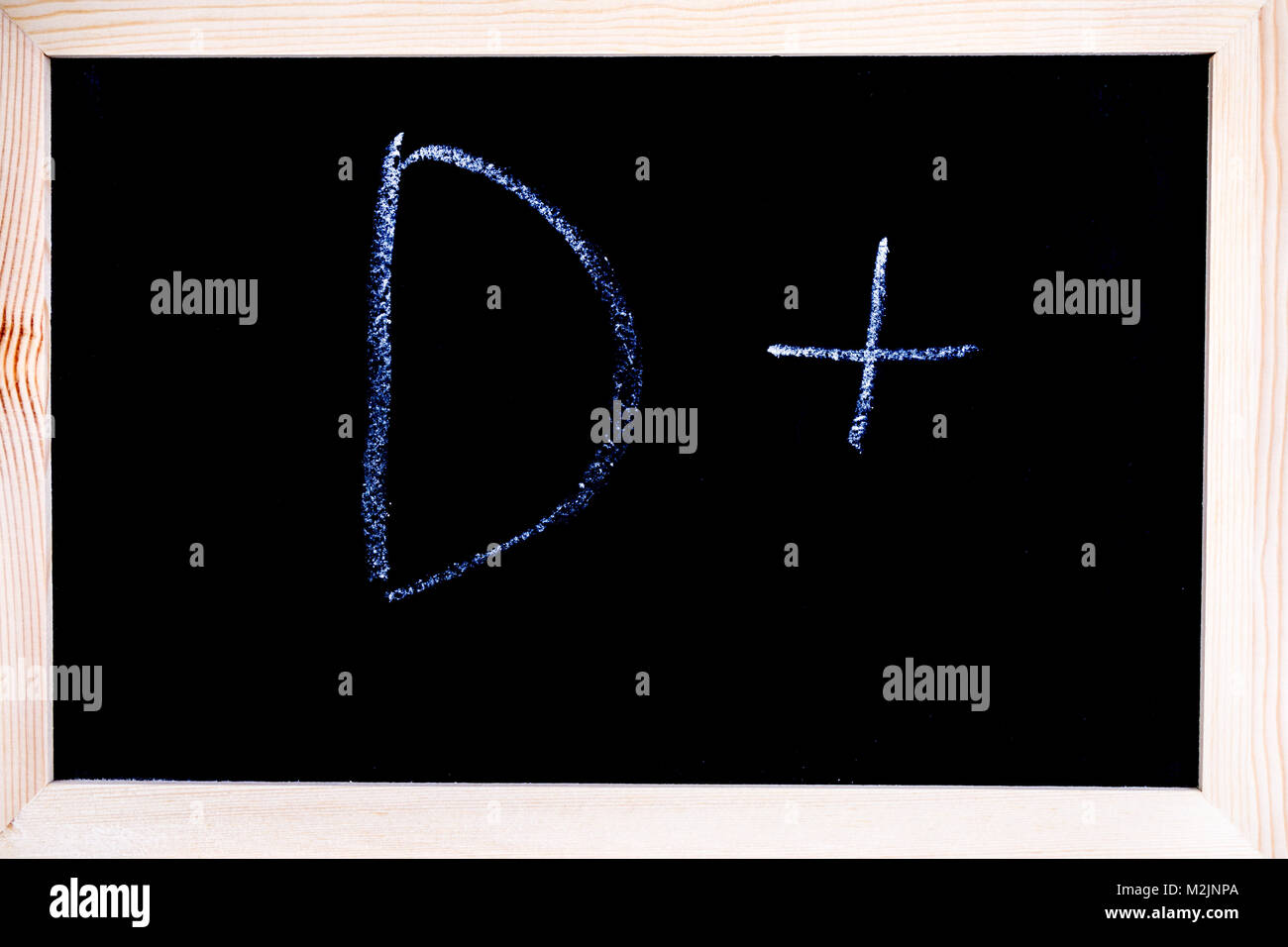 Blackboard with white chalk writing showing grade D+ Stock Photo - Alamy