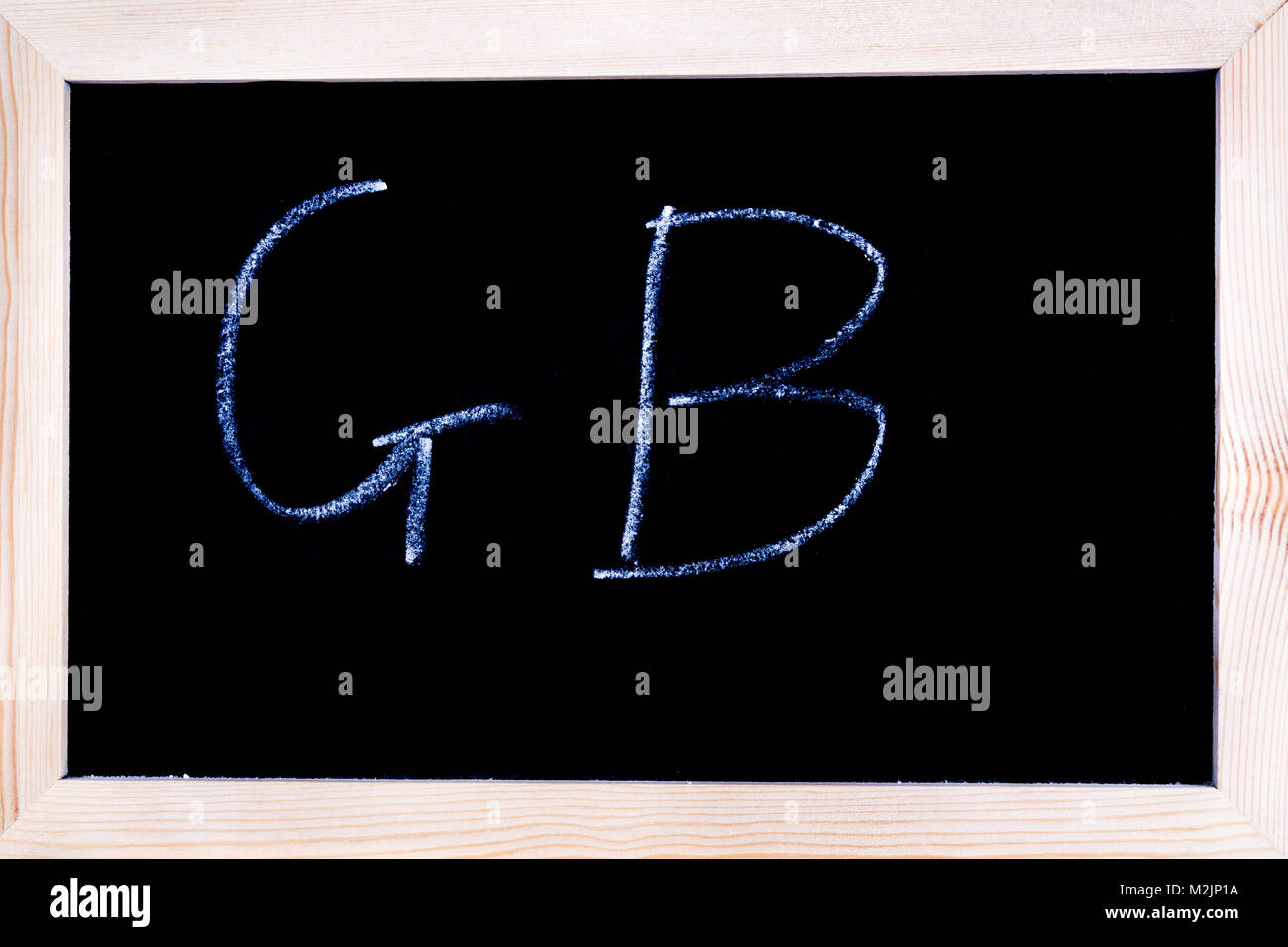 Blackboard with white chalk writing showing GB Stock Photo - Alamy