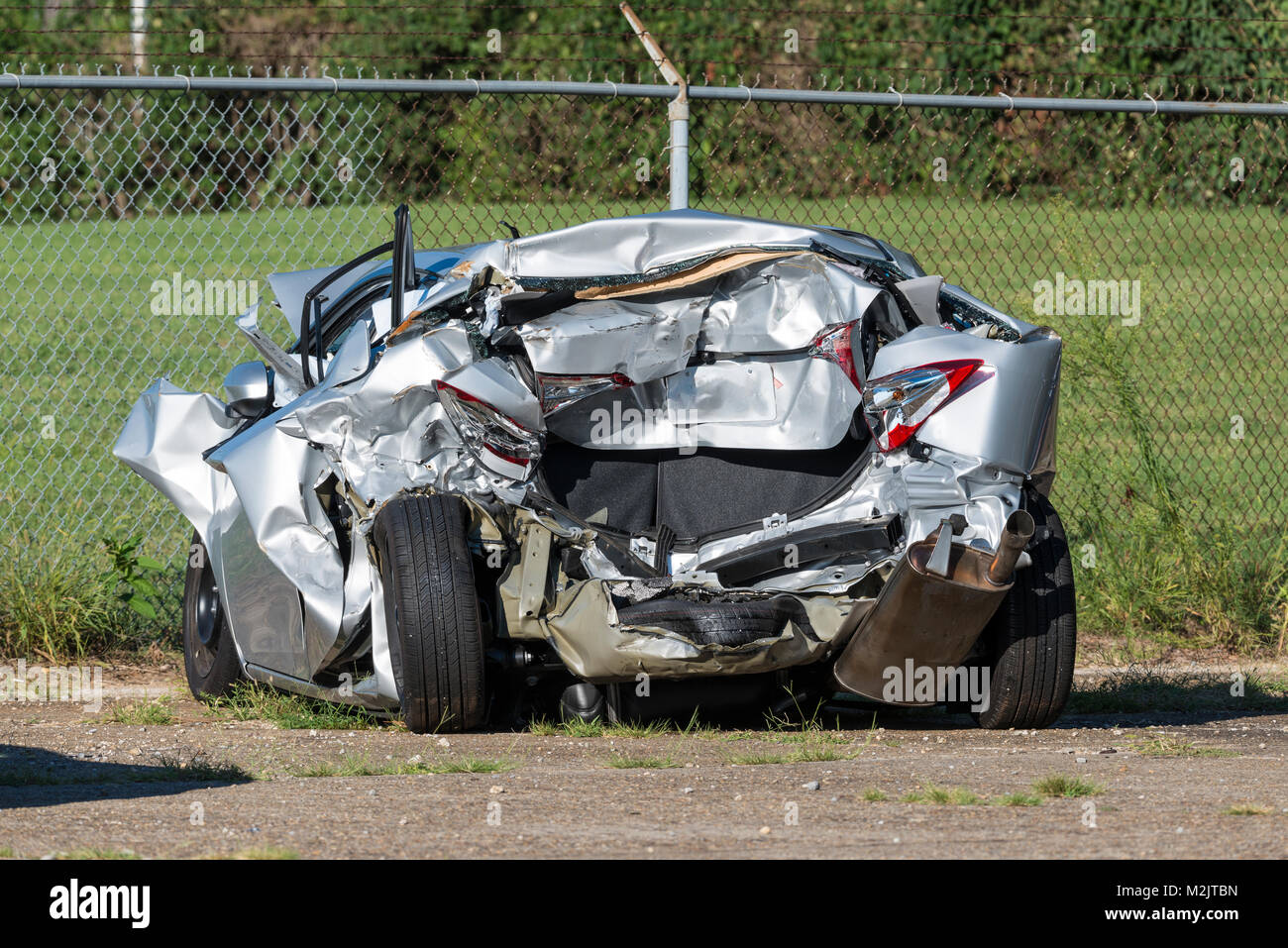 Horizontal shot of a car demolished by a wreck Stock Photo - Alamy