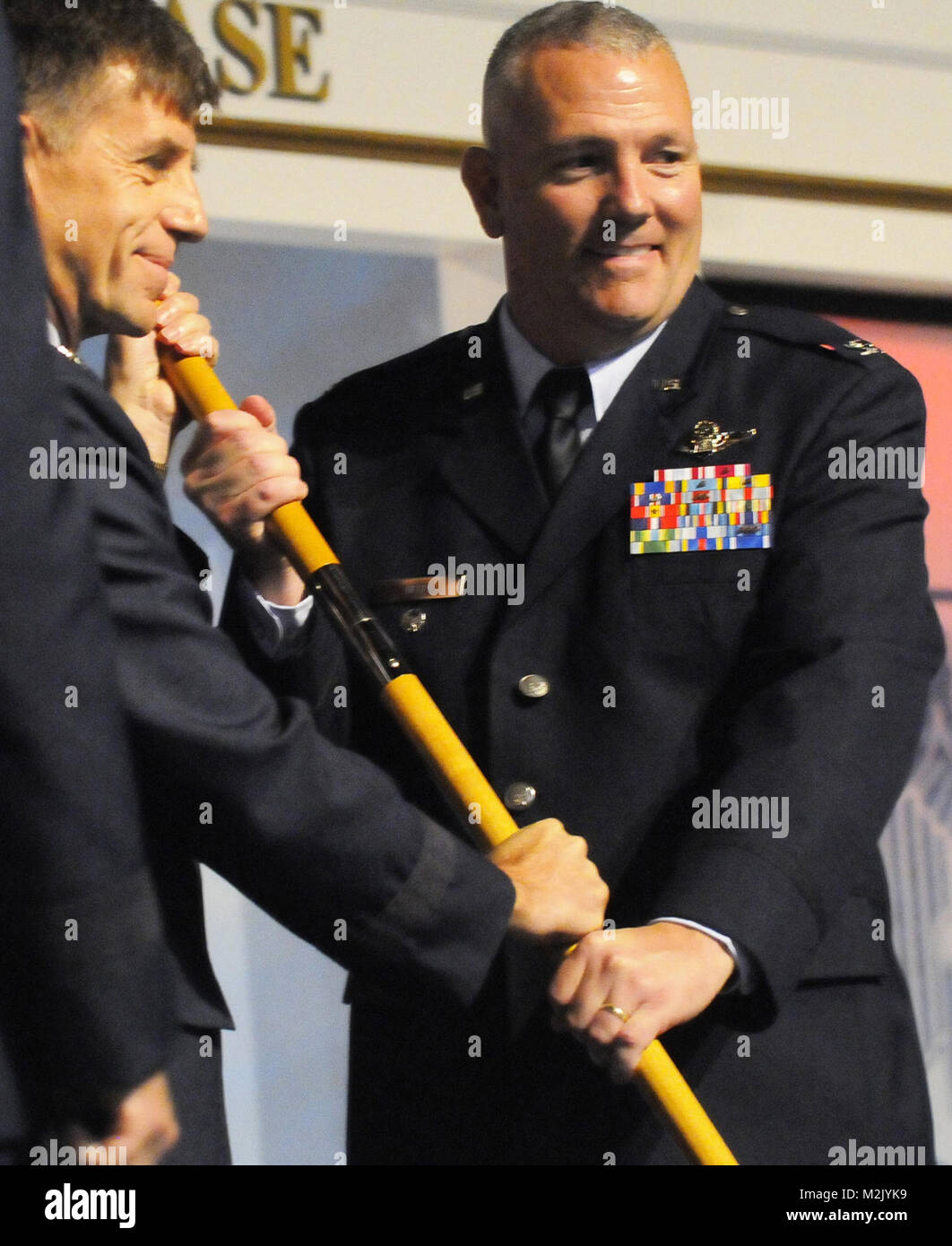 Colonel Jeffrey A. Herd, right, accepts the guidon fromMaj. Gen Scott ...