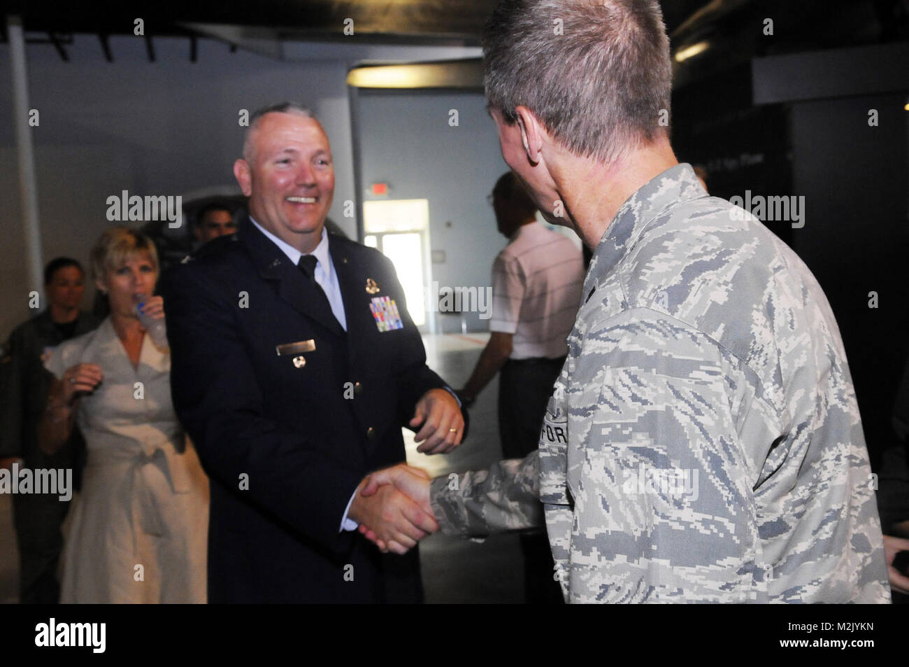 Colonel Jeffrey A. Herd,is congratulated and welcomed after becoming ...