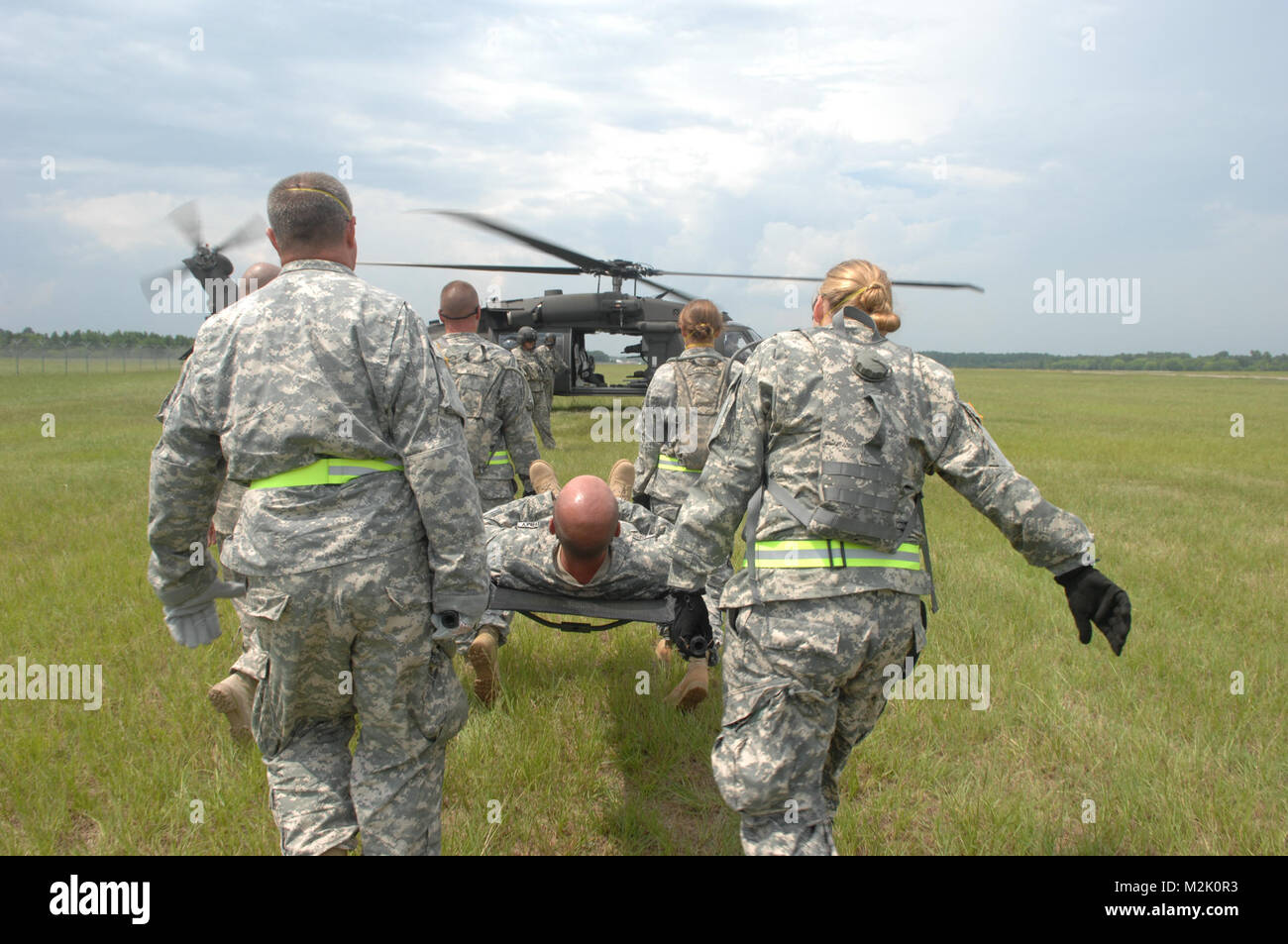 U.S Air Force and U.S. Army aeromedical evacuation personnel practice ...