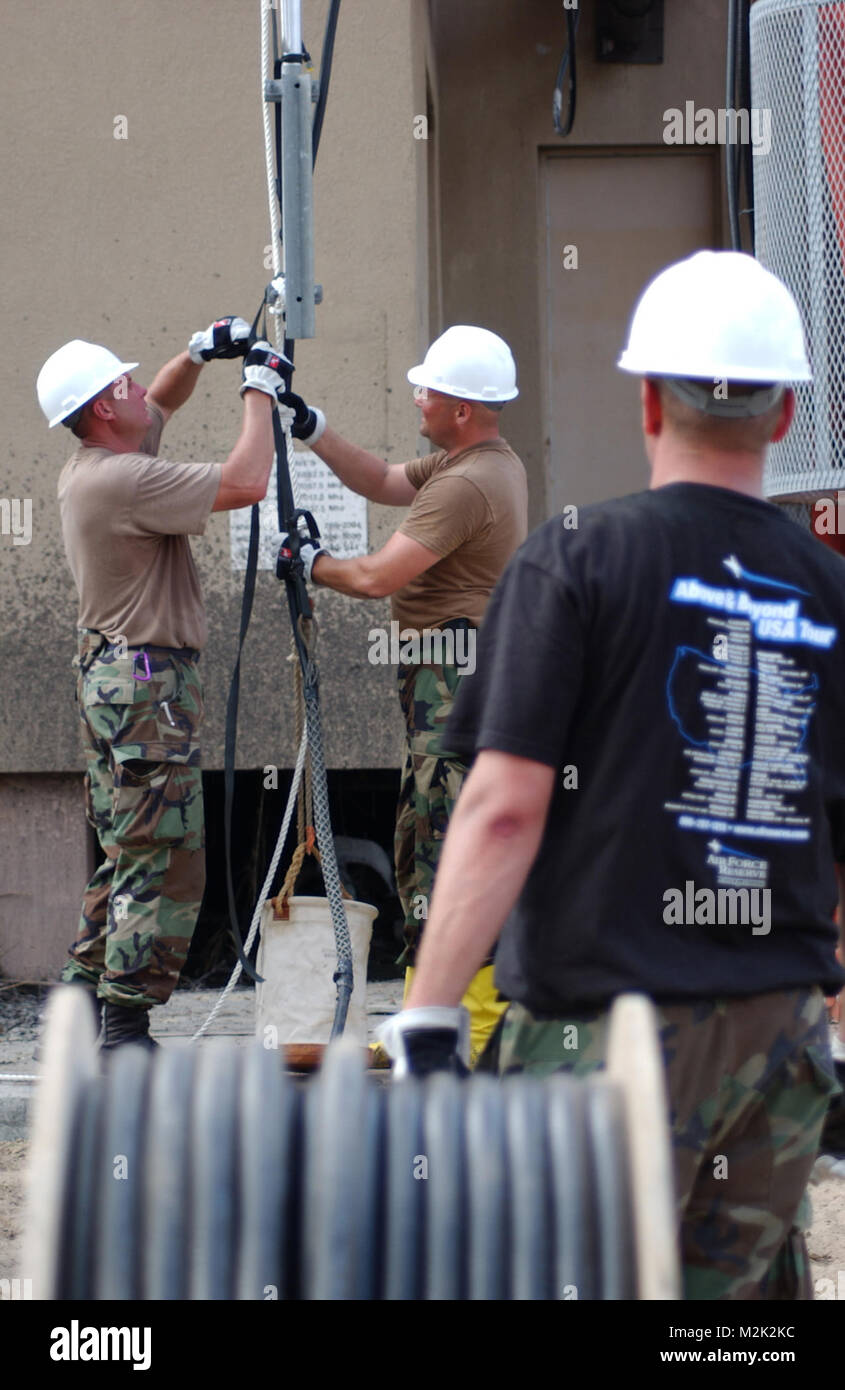 Members of the 214th Engineering and Installion Squadron from the ...