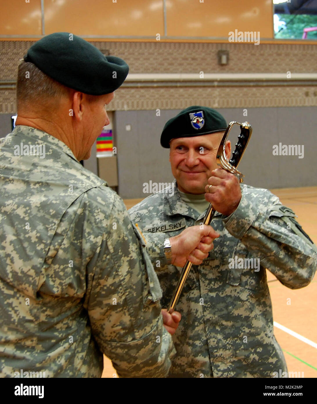 Command Sergeant Major Charles Sekelsky, right, receives the ...