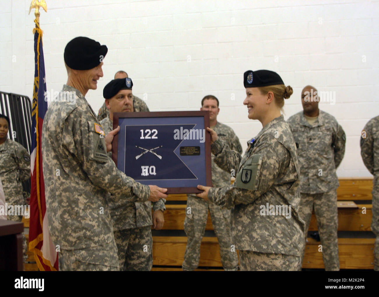 Capt. Kate Sanborn receives a framed Headquarters Company, 122nd ...